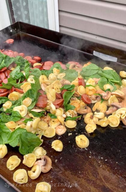 Blackstone Grilled Kielbasa, Tortellini, & Spinach Casserole - Sparkles to Sprinkles