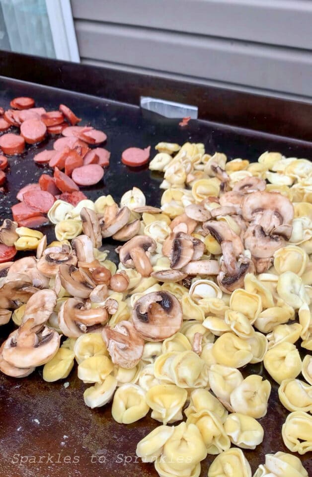 Blackstone Grilled Kielbasa, Tortellini, & Spinach Casserole - Sparkles to Sprinkles