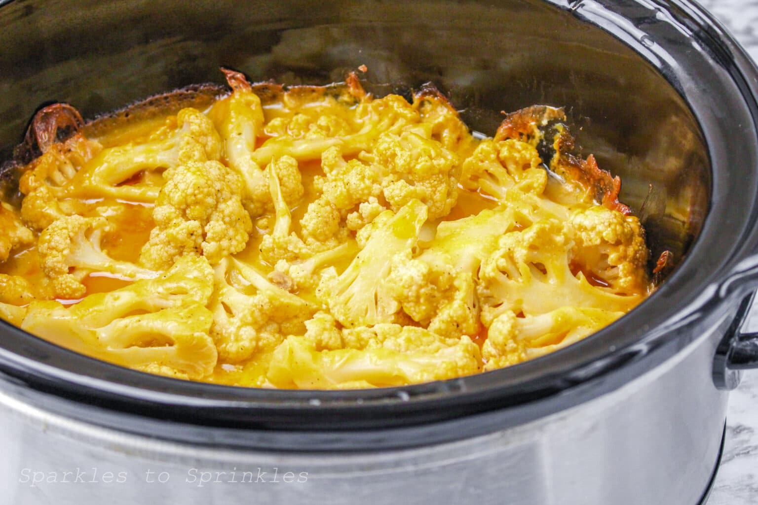 Slow Cooker Cheesy Cauliflower - Sparkles to Sprinkles