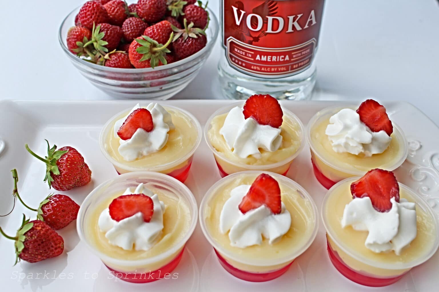 Strawberry Cheesecake Pudding Shots - Sparkles to Sprinkles